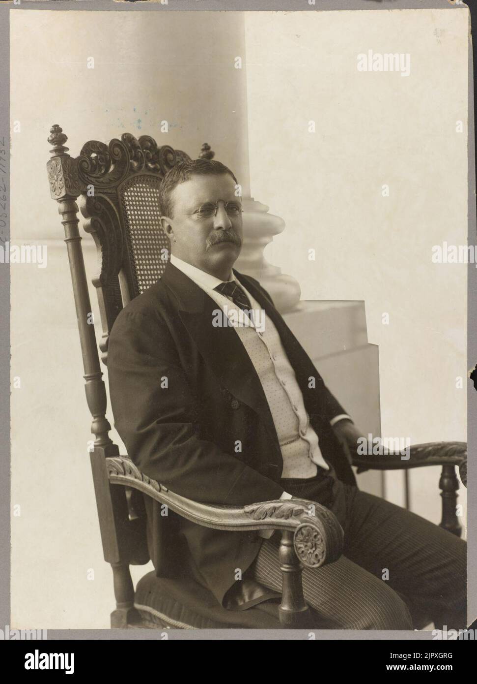 Theodore Roosevelt, three-quarter length portrait, seated, turned right ...