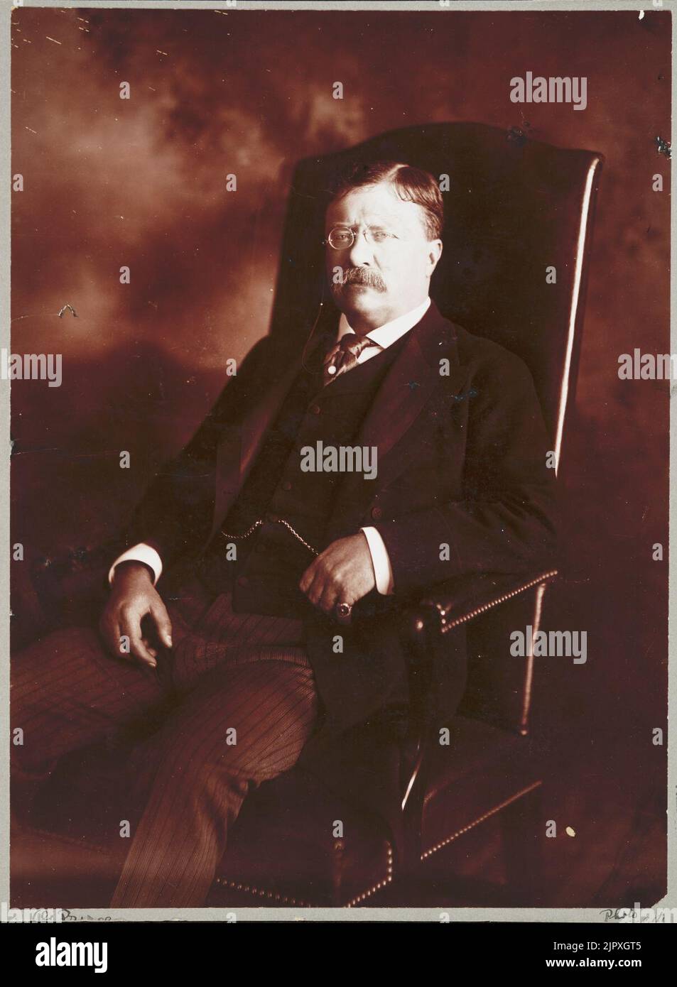 Theodore Roosevelt, three-quarter length portrait, seated, facing left ...
