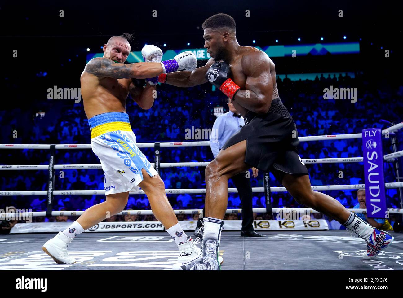Oleksandr Usyk (left) in action against Anthony Joshua during their World Heavyweight ...
