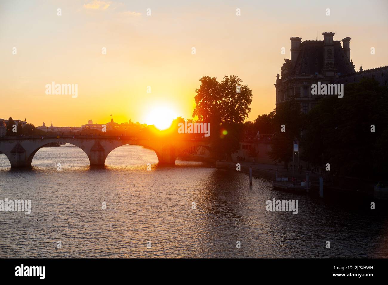 View of the famous bridge called Pont Royal and the Louvre Museum at ...