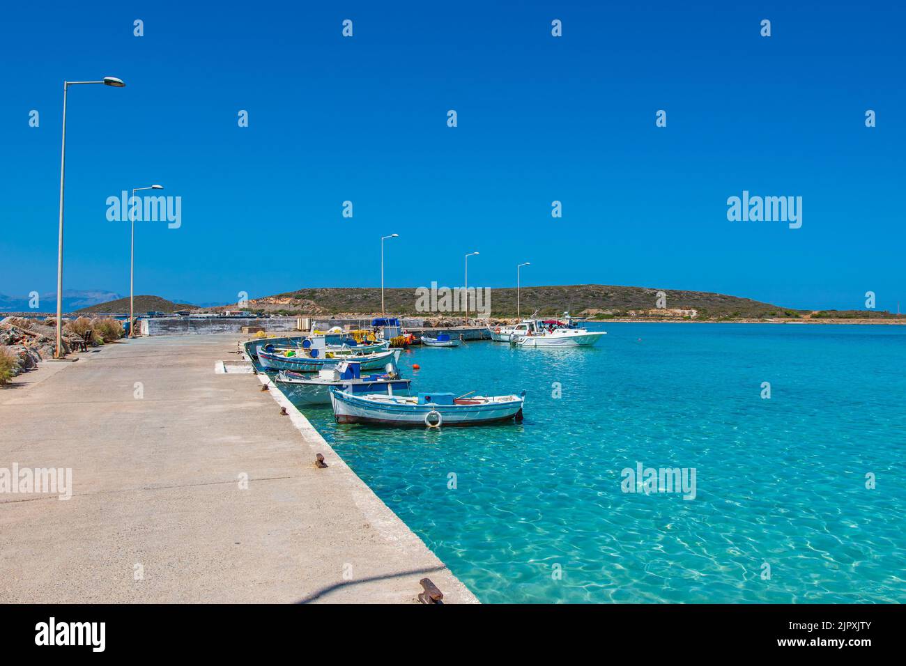 Traditional wooden fishing boats in Diakofti harbor in Kythira island ...