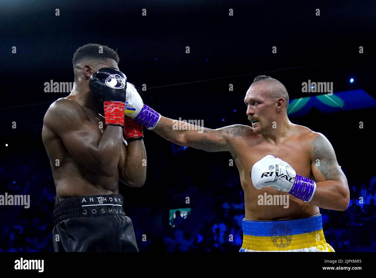 Anthony Joshua (left) and Oleksandr Usyk in action during their World Heavyweight Championship ...