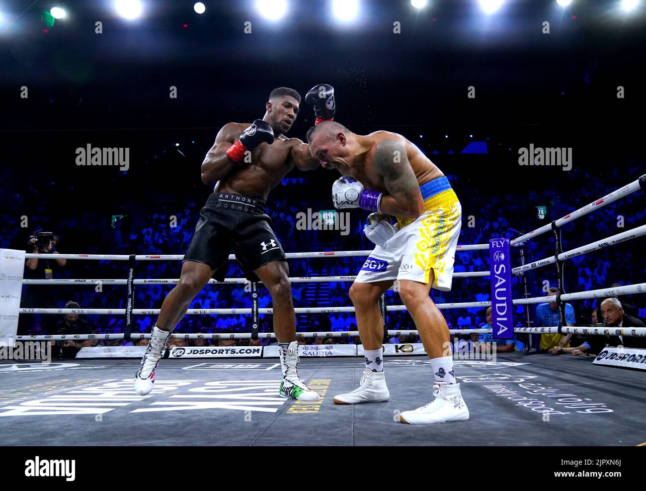 Anthony Joshua (left) and Oleksandr Usyk in action during their World Heavyweight Championship ...