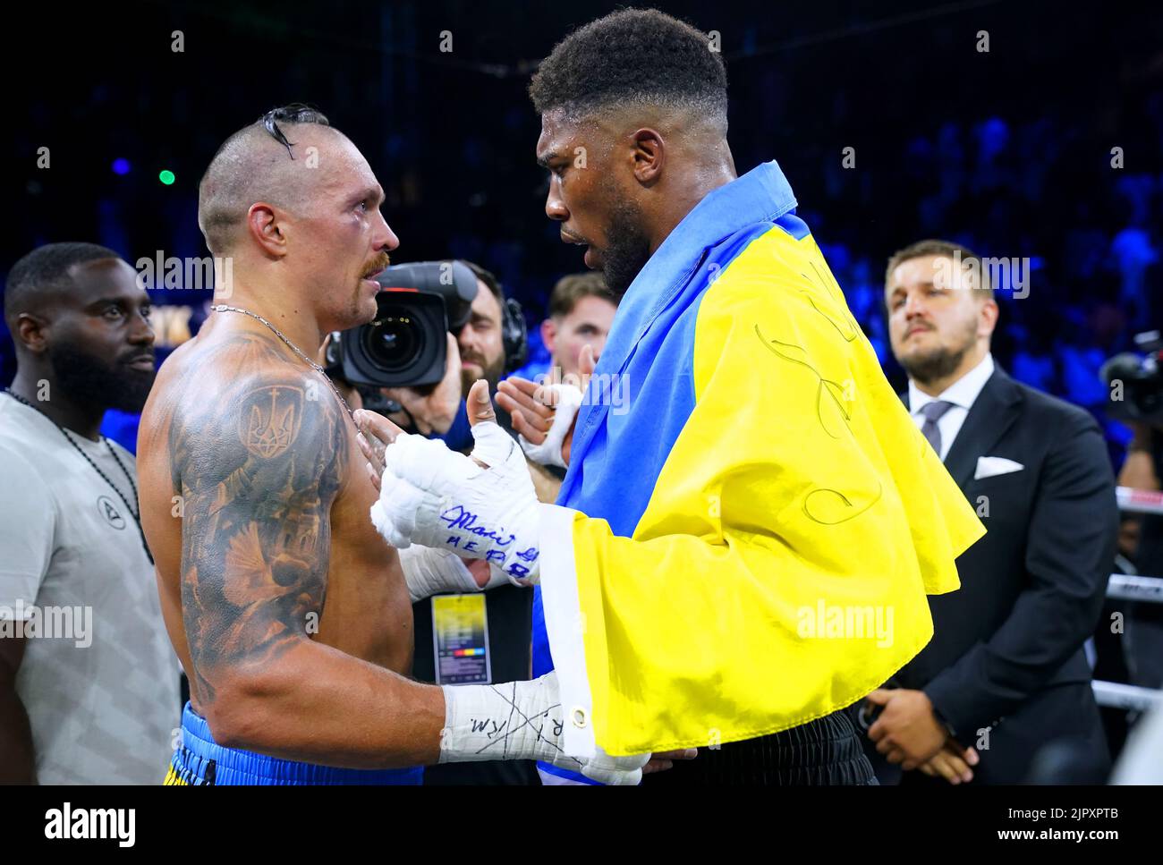 Anthony Joshua (right) and Oleksandr Usyk exchange words at the end of their World Heavyweight ...