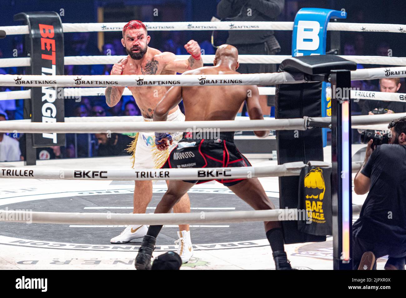 Michael Page of England and Mike Perry of USA during their middleweight ...