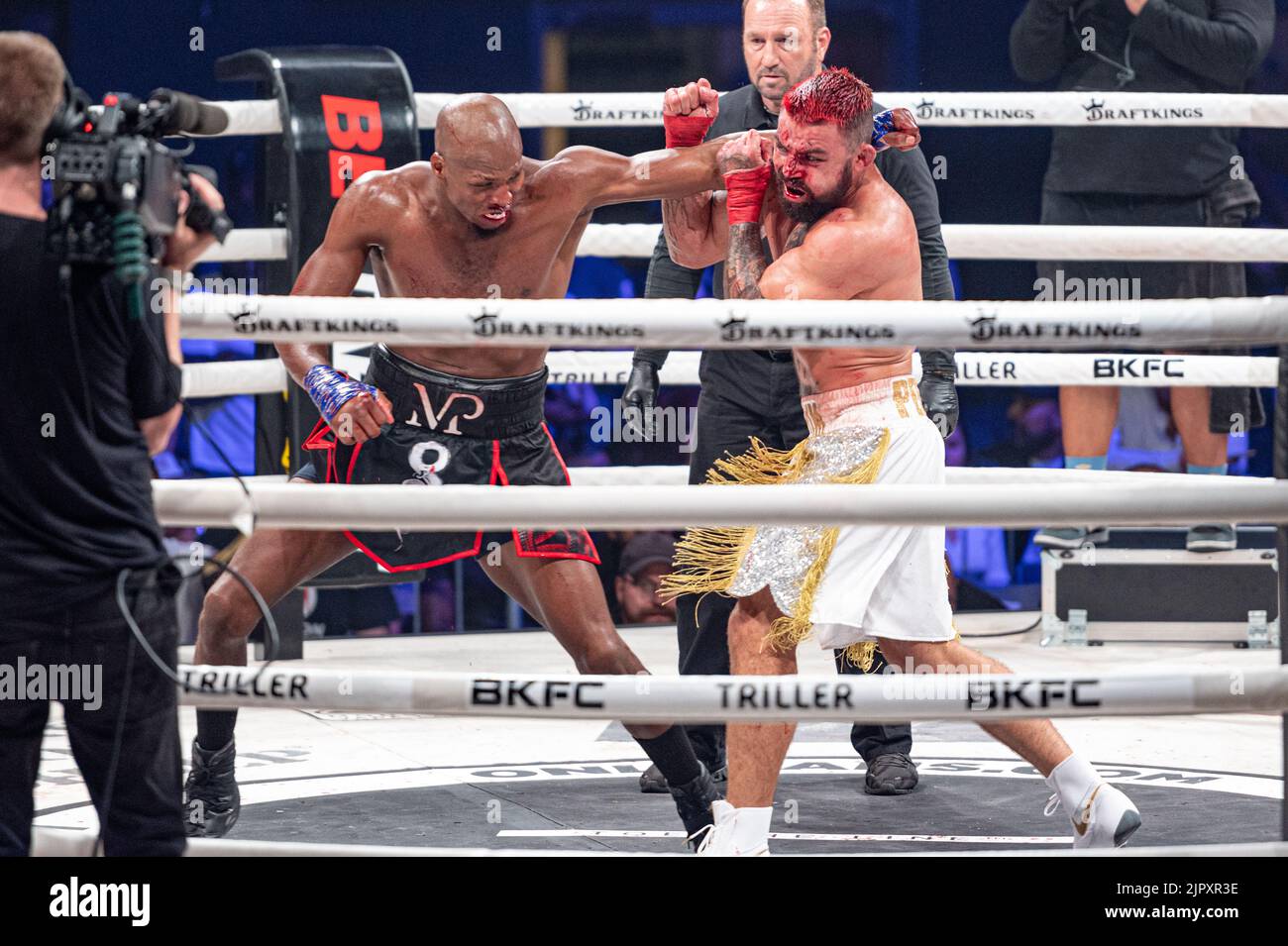 Michael Page of England and Mike Perry of USA during their middleweight ...