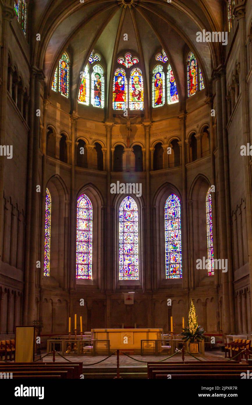 The painted stained glass windows inside Lyon Cathedral, France Stock ...