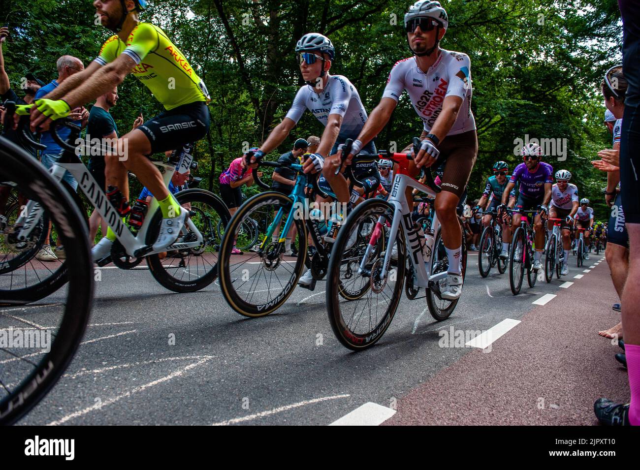 The peloton seen crossing the highest point of the day. The peloton set ...