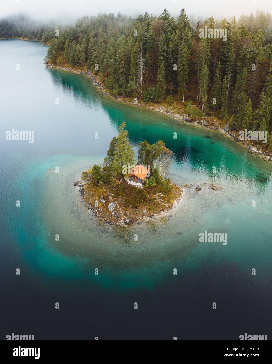 A top view of beautiful Eibsee lake with the little island, Germany ...