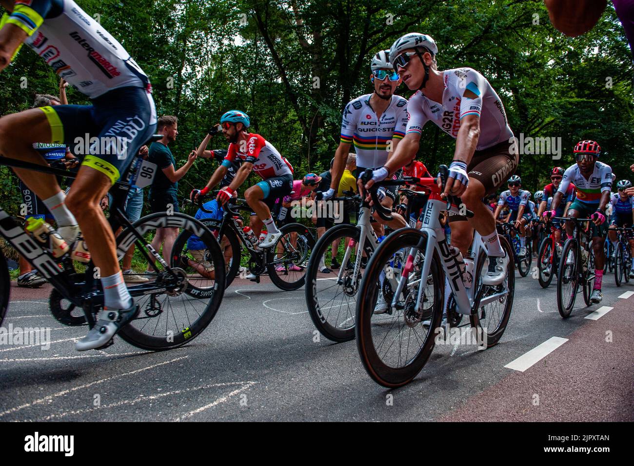 Some riders are seen talking to each other while running up the ...