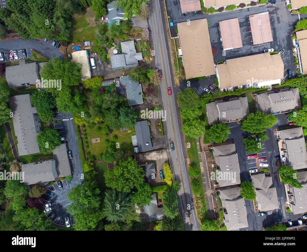 Shooting from the air. Green provincial town. Lots of greenery ...