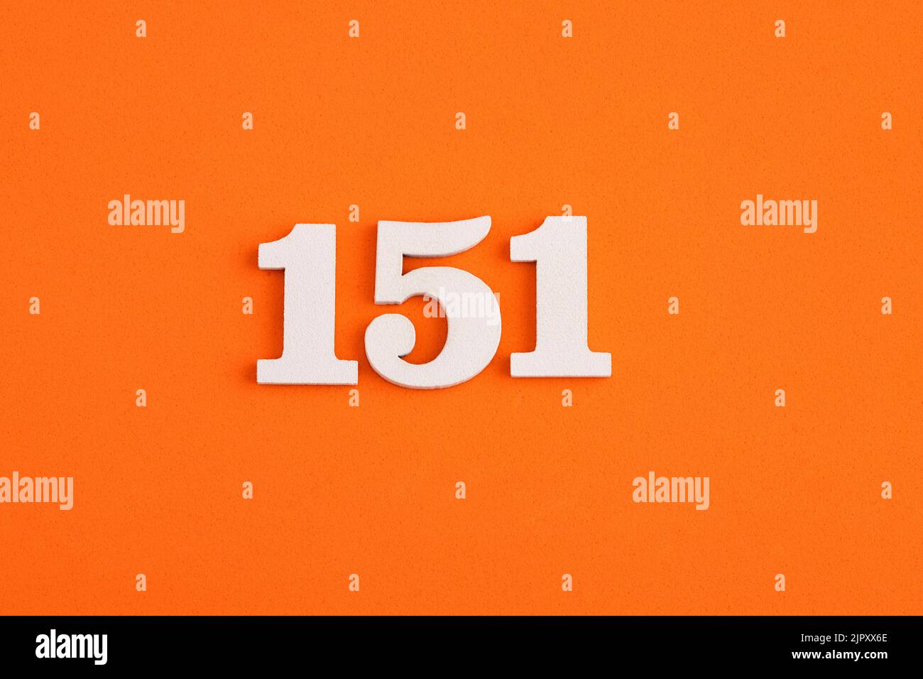 Number 151 - On orange foam rubber background Stock Photo - Alamy