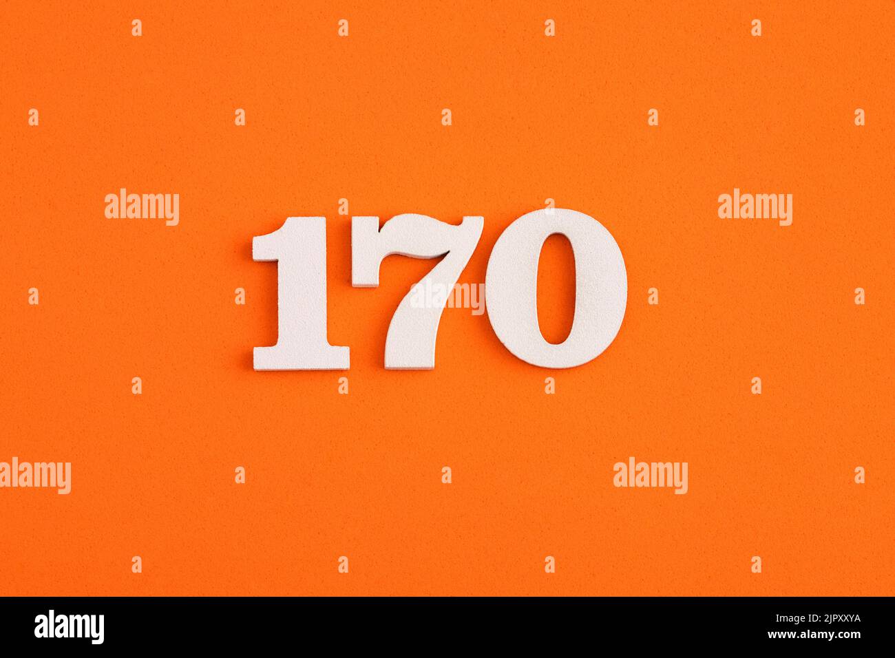 White wooden number 170 on eva rubber orange background Stock Photo - Alamy