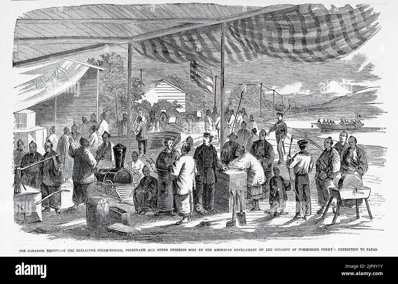 The Japanese receiving the miniature steam-engine, telegraph and other ...