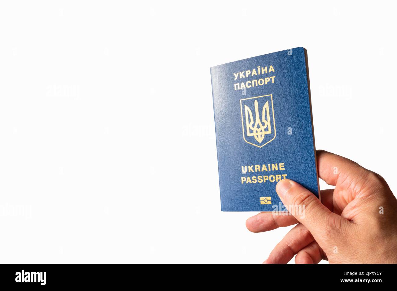 Ukrainian Biometric Passport In A Female Hand On A White Background