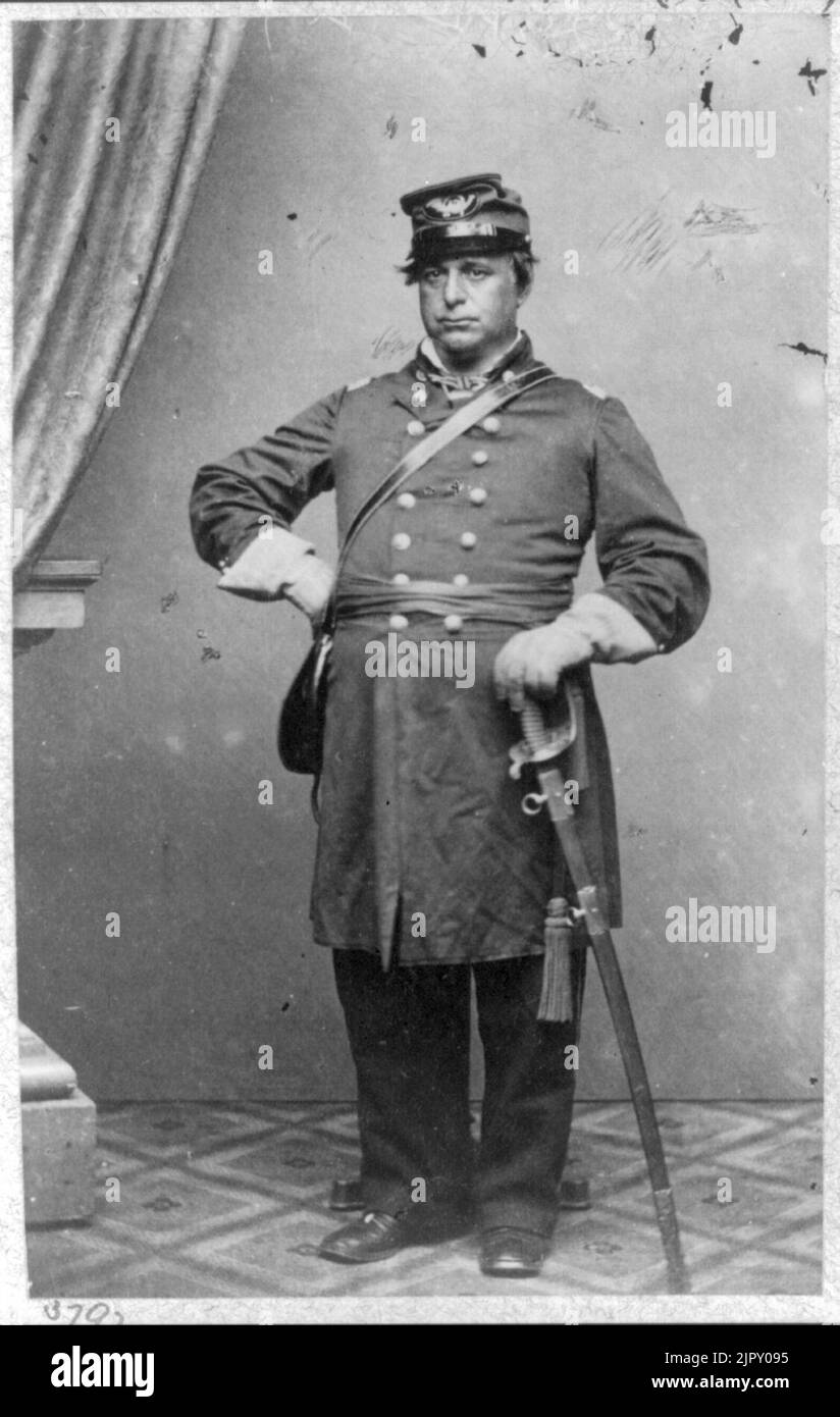 Thomas A. Rowley, full, standing, facing slightly left in col. uniform ...