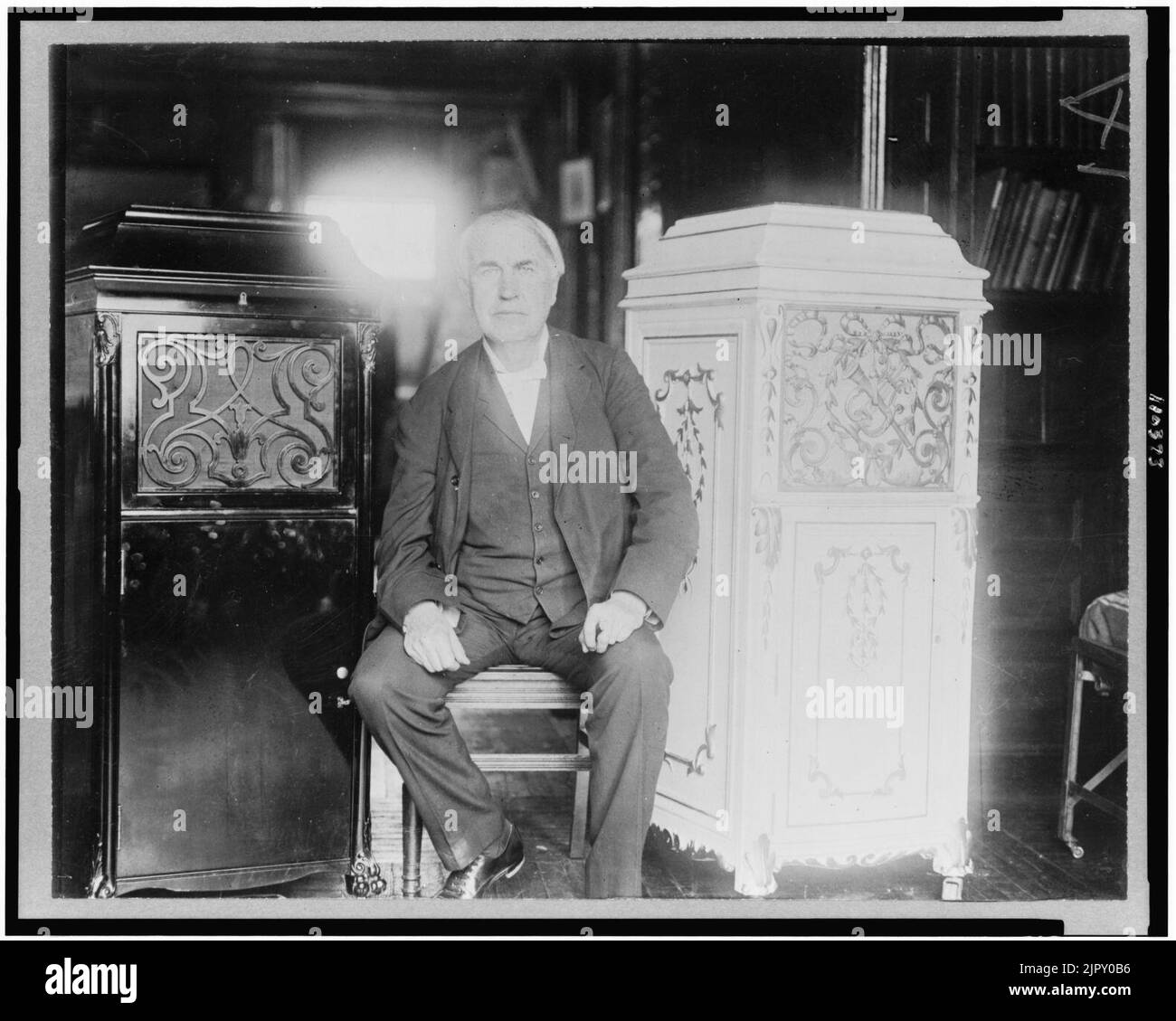Thomas Alva Edison, full-length portrait, seated, facing front, between ...