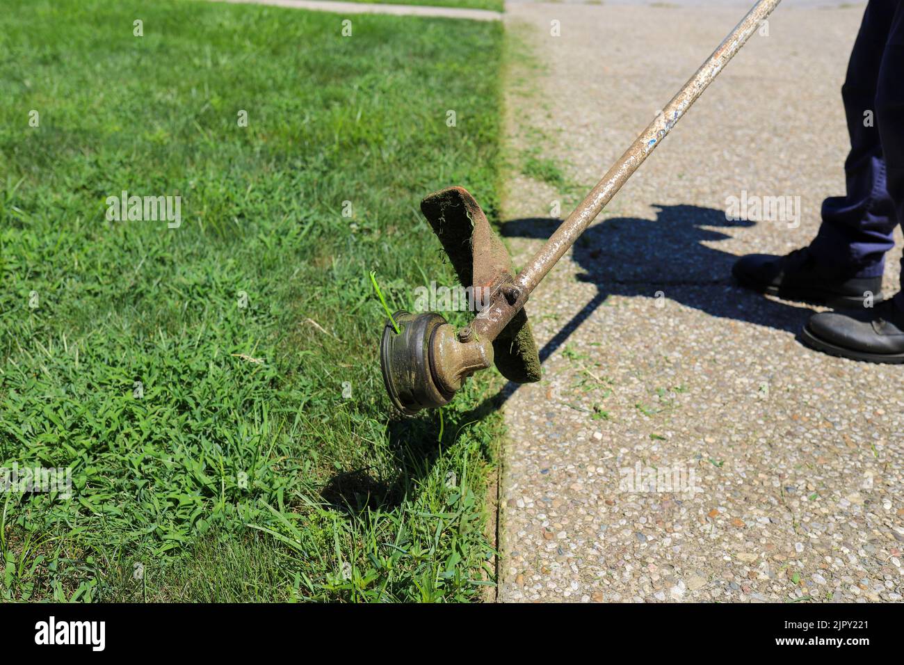 Weeding grass hi-res stock photography and images - Alamy