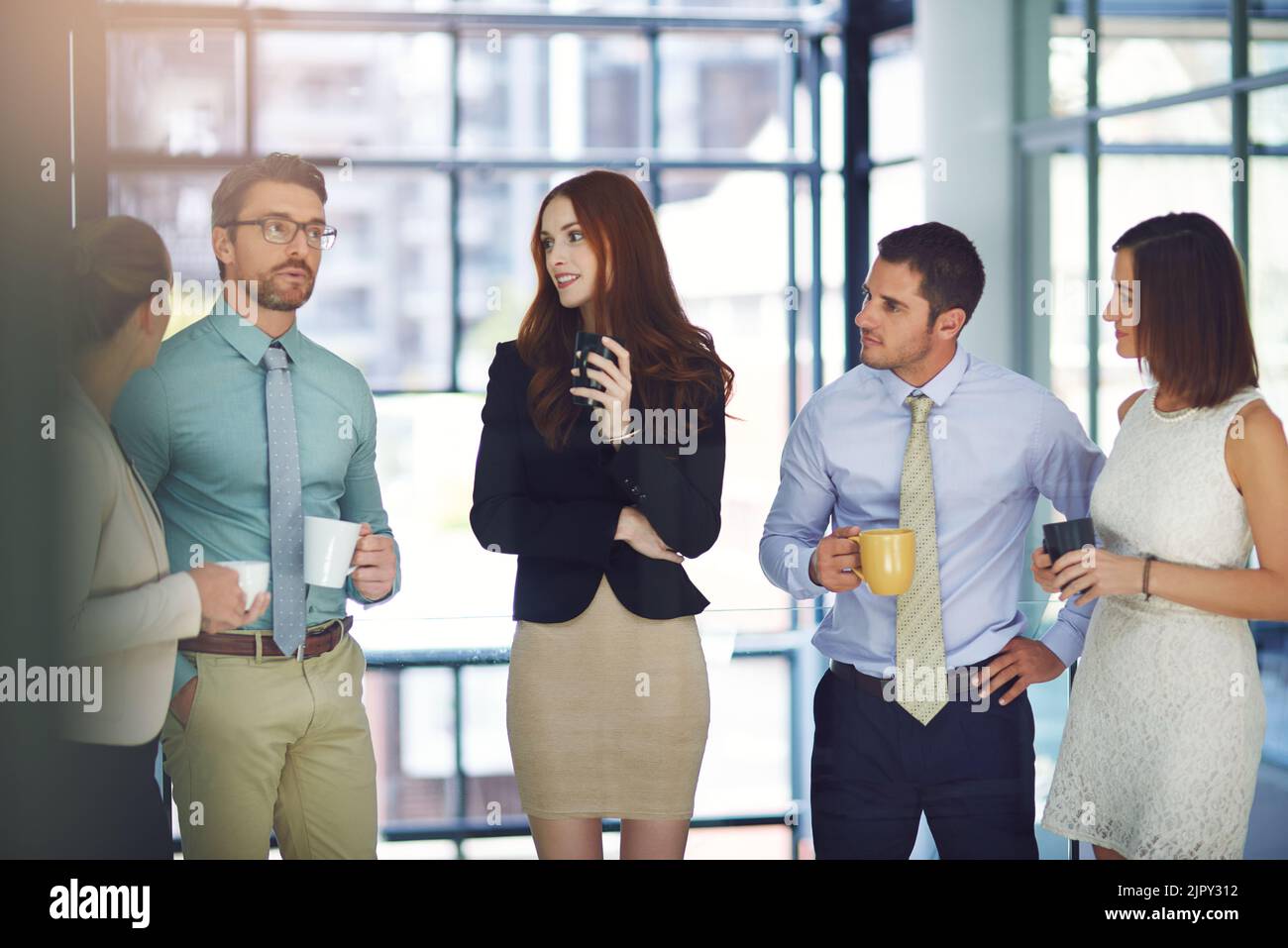 Talking about how we can improve the business. colleagues having a ...