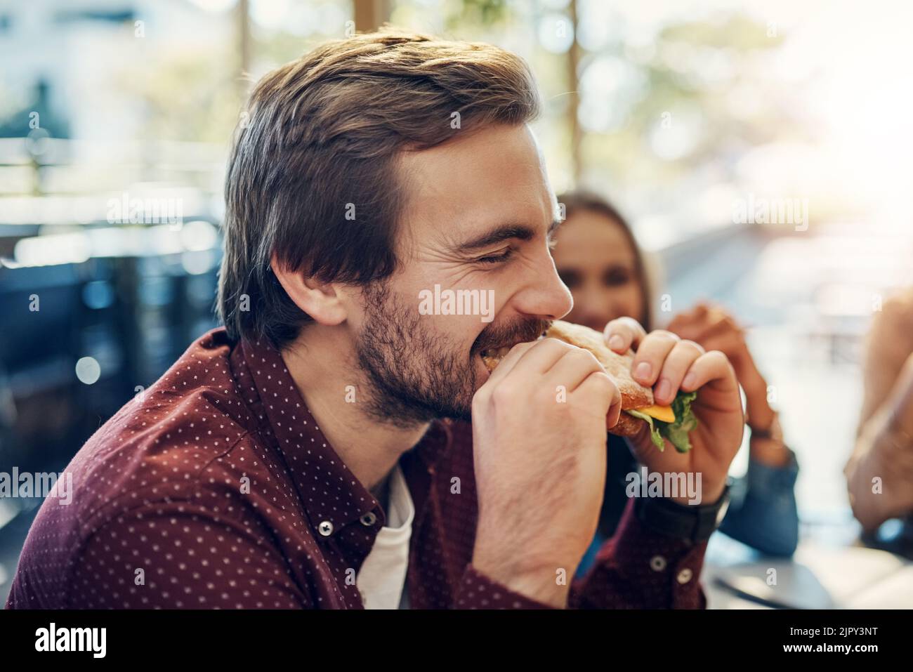 Enjoying every bite hi-res stock photography and images - Alamy