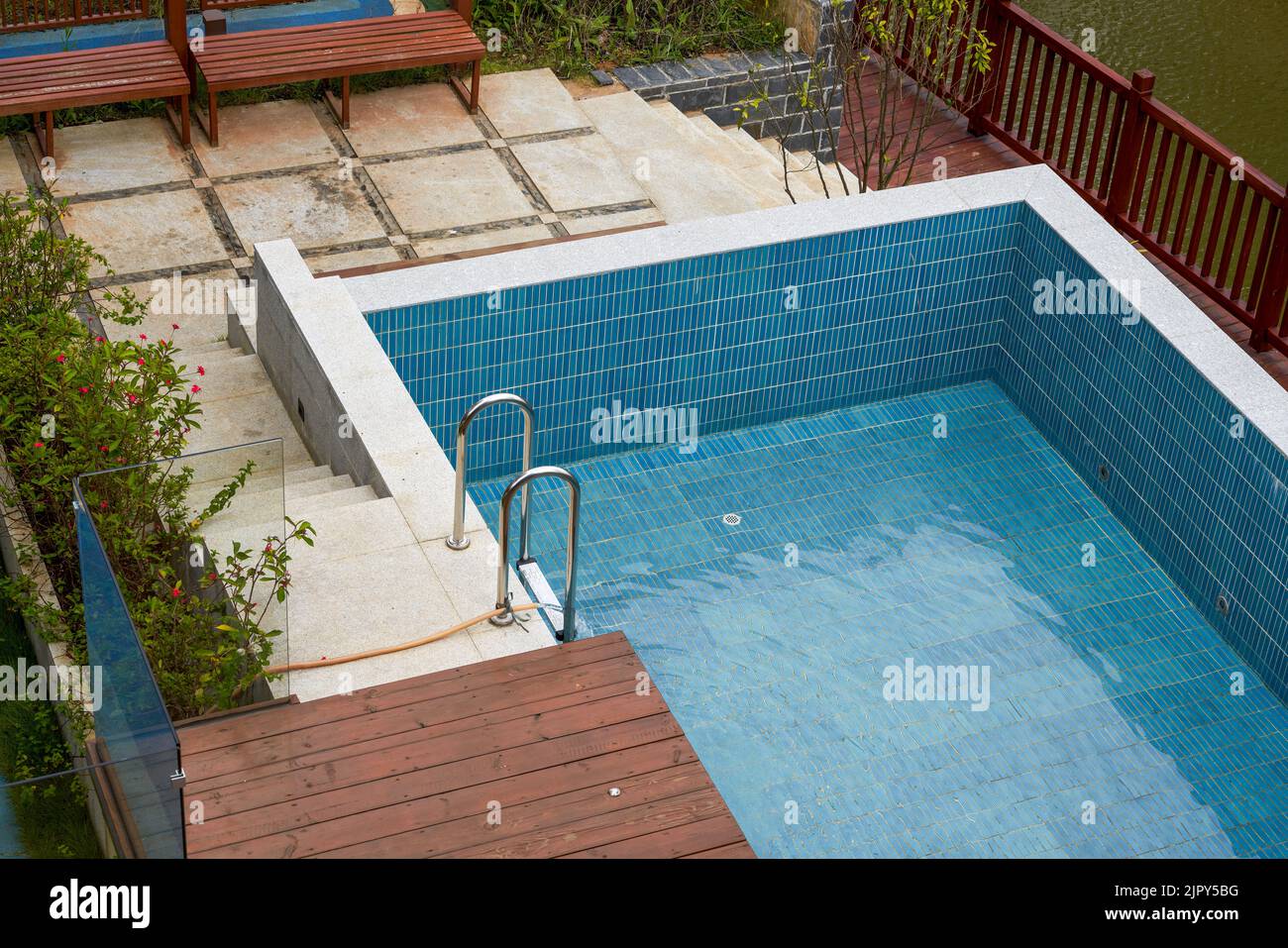 Private pool view from the backyard of the villa Stock Photo - Alamy