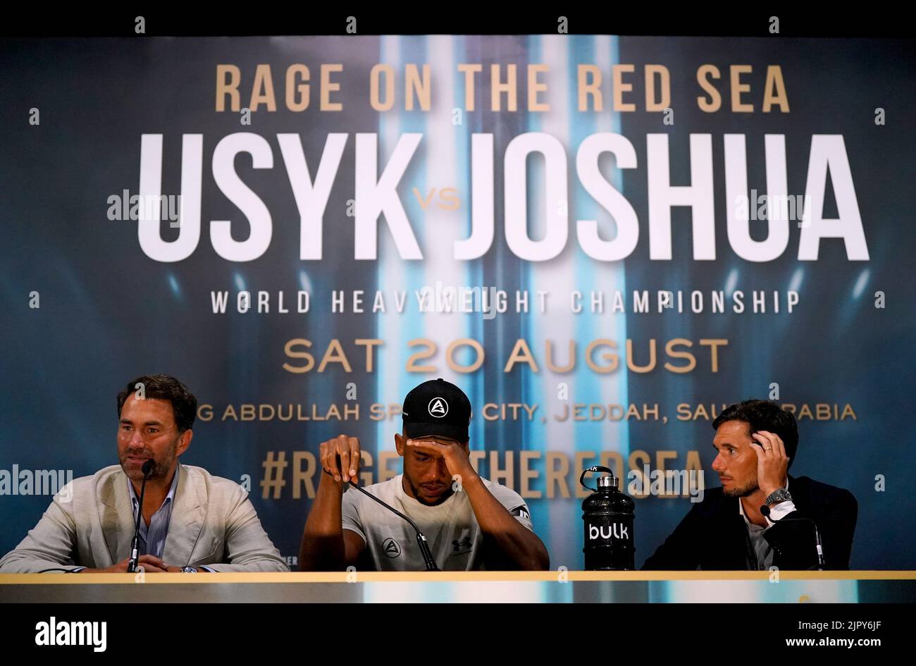 Anthony Joshua (centre), boxing promoter Eddie Hearn (left) and Freddie ...
