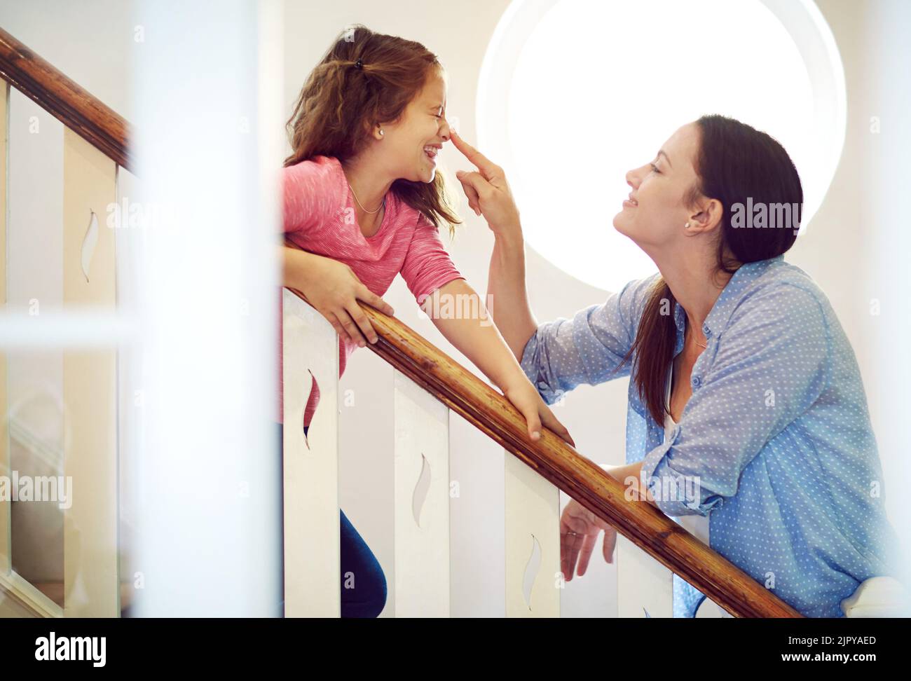 Youve got my nose. a happy young mother and daughter enjoying their time together Stock Photo ...