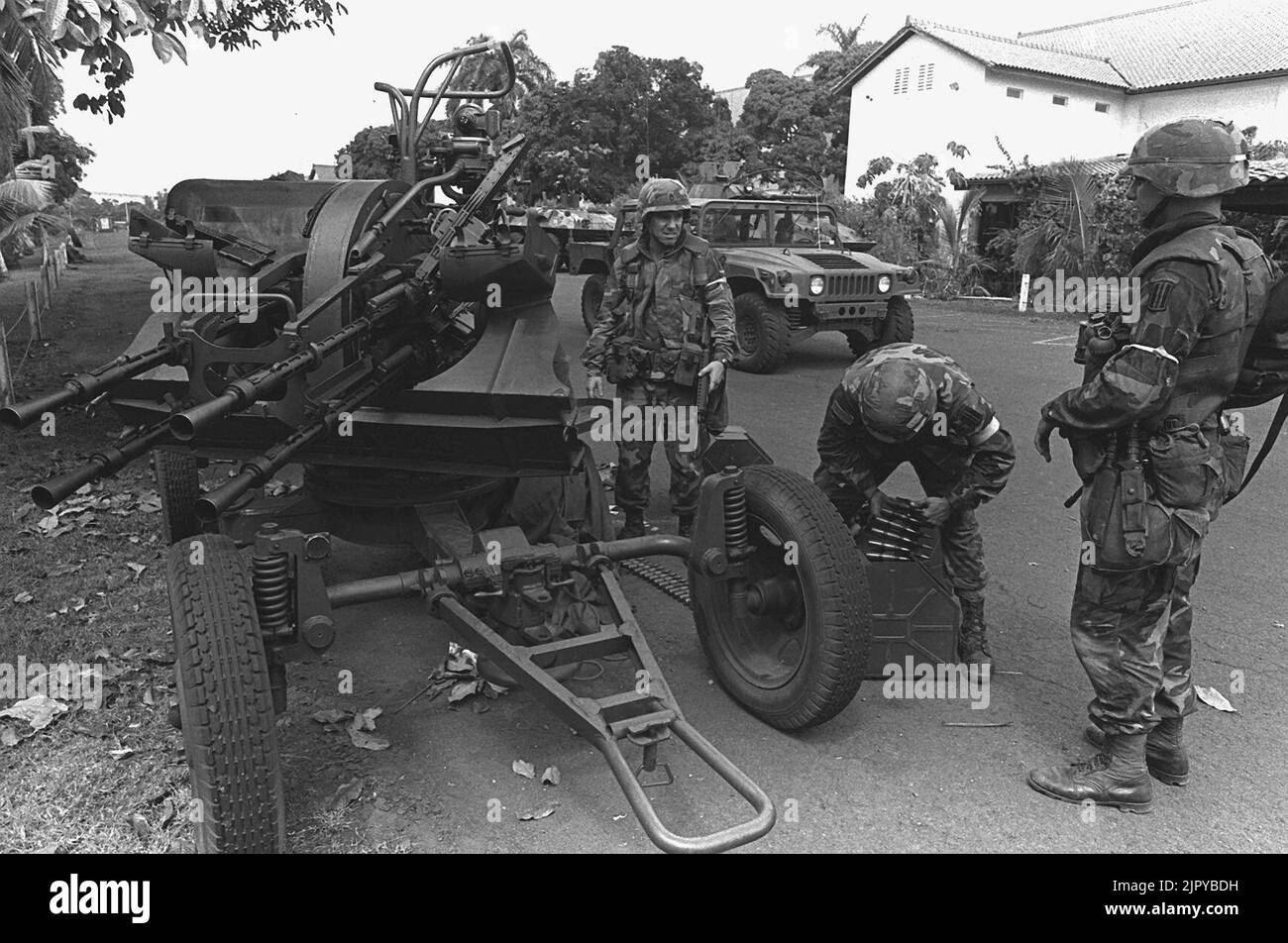 Three 5th Infantry Division (Mechanized) soldiers inspect a Soviet-made ... Three 5th Infantry Division (Mechanized) soldiers inspect a Soviet-made ...