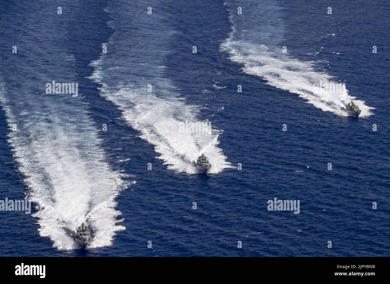 Three CRS-2's Mark VI patrol boats maneuver in formation near Guam - 2 ...