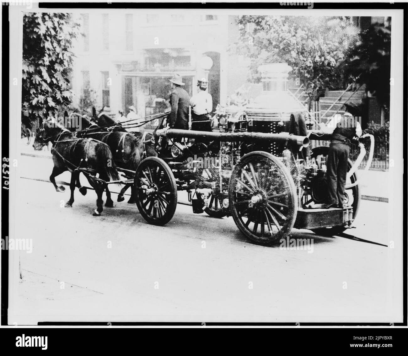 Three firemen on fire engine drawn by three horses, Washington, D.C ...