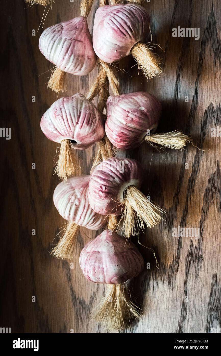 String of onions hi-res stock photography and images - Alamy