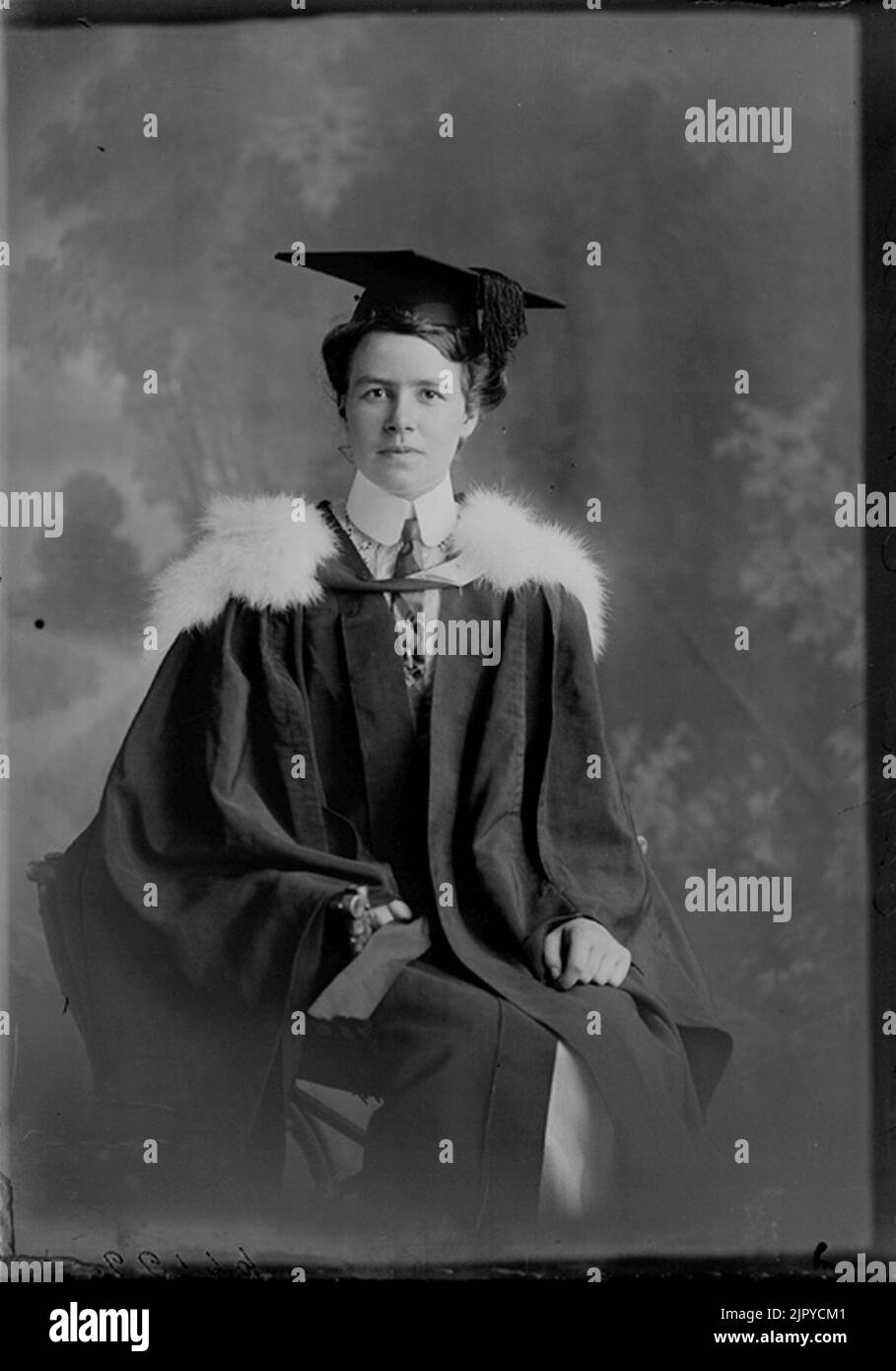 Three quarter length portrait of Miss Kate Violet Edgerley in academic ...