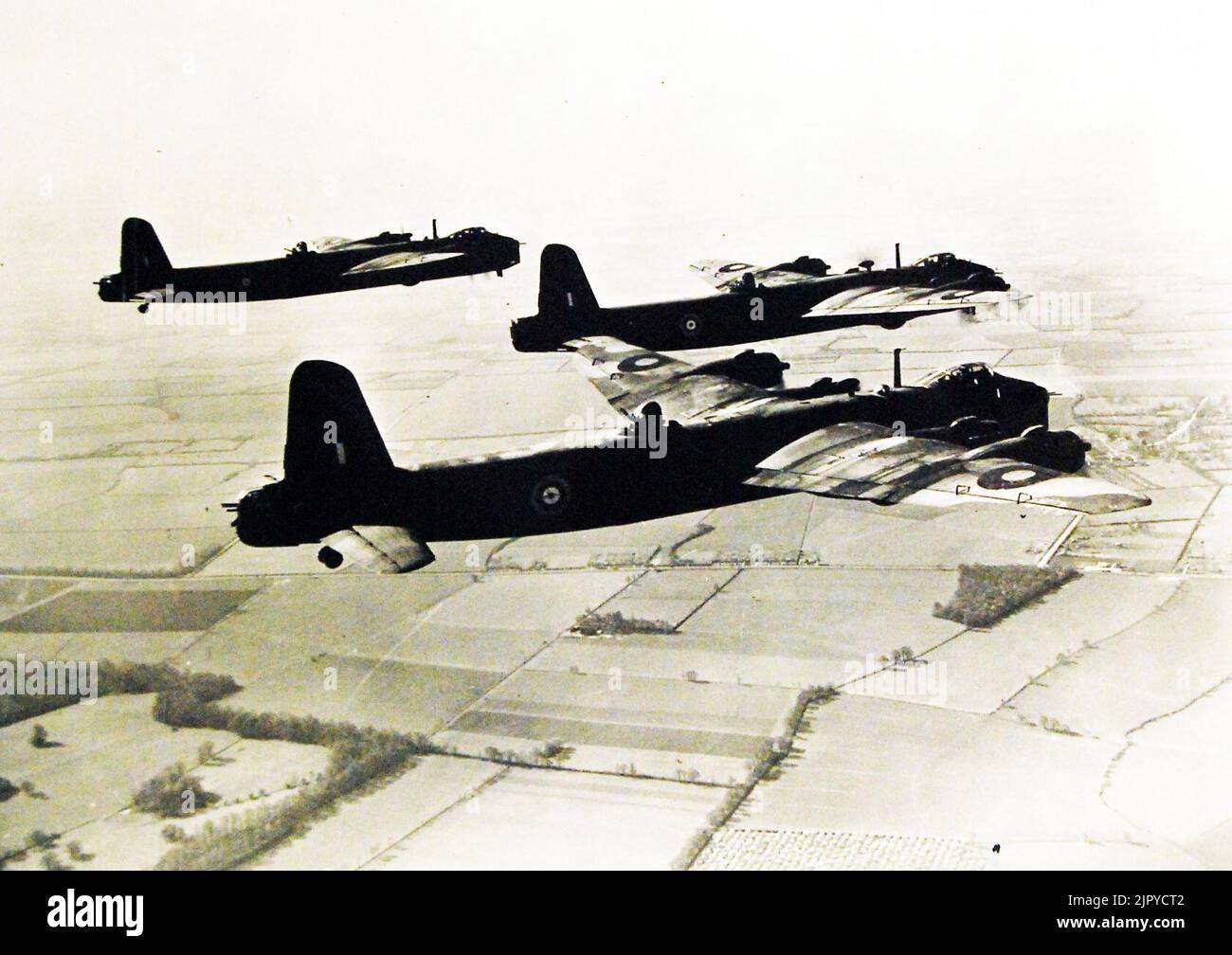 Three Short Stirling bombers taking off over Great Britain, 1942-43 ...
