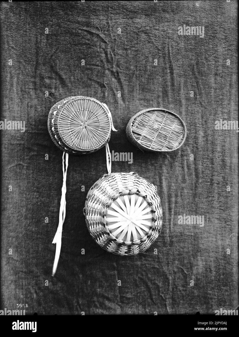 Three unidentified Indian baskets on display, ca.1900 Stock Photo - Alamy