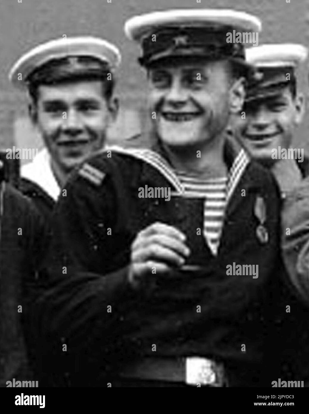 Three USSR sailors drinking beer from ''olive drab color beer cans on ...