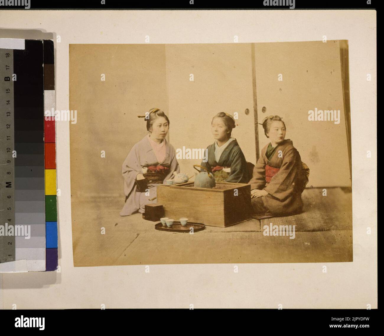Three women having tea Stock Photo - Alamy