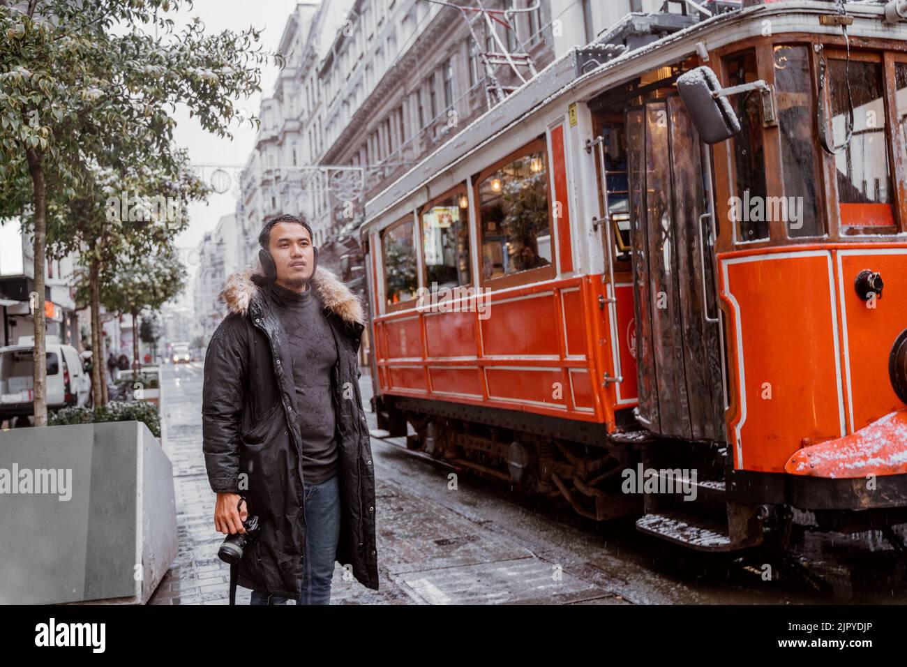 asian man walking in historical old town in istanbul Stock Photo - Alamy