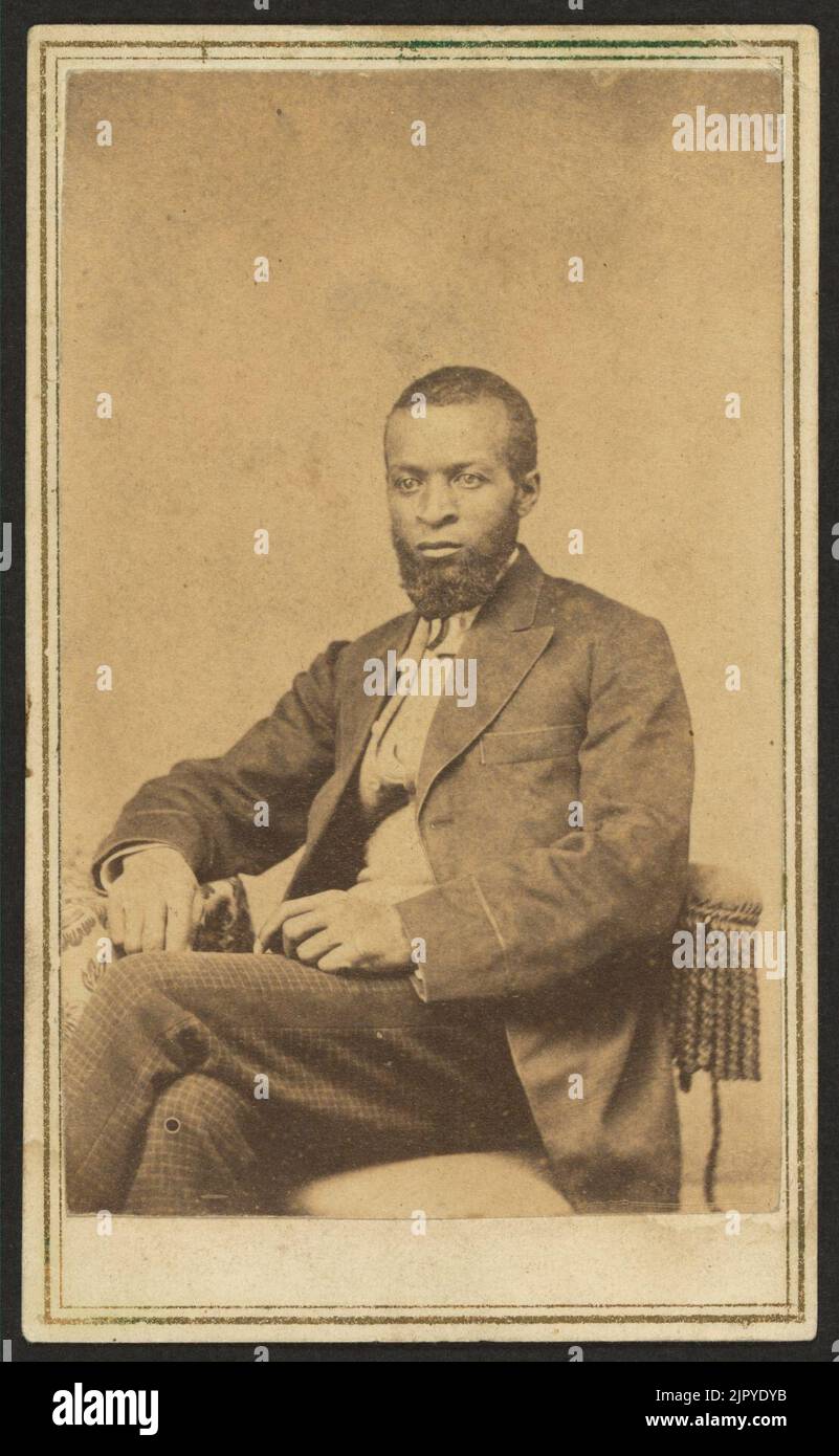 Three-quarter-length portrait of an African American man, seated ...