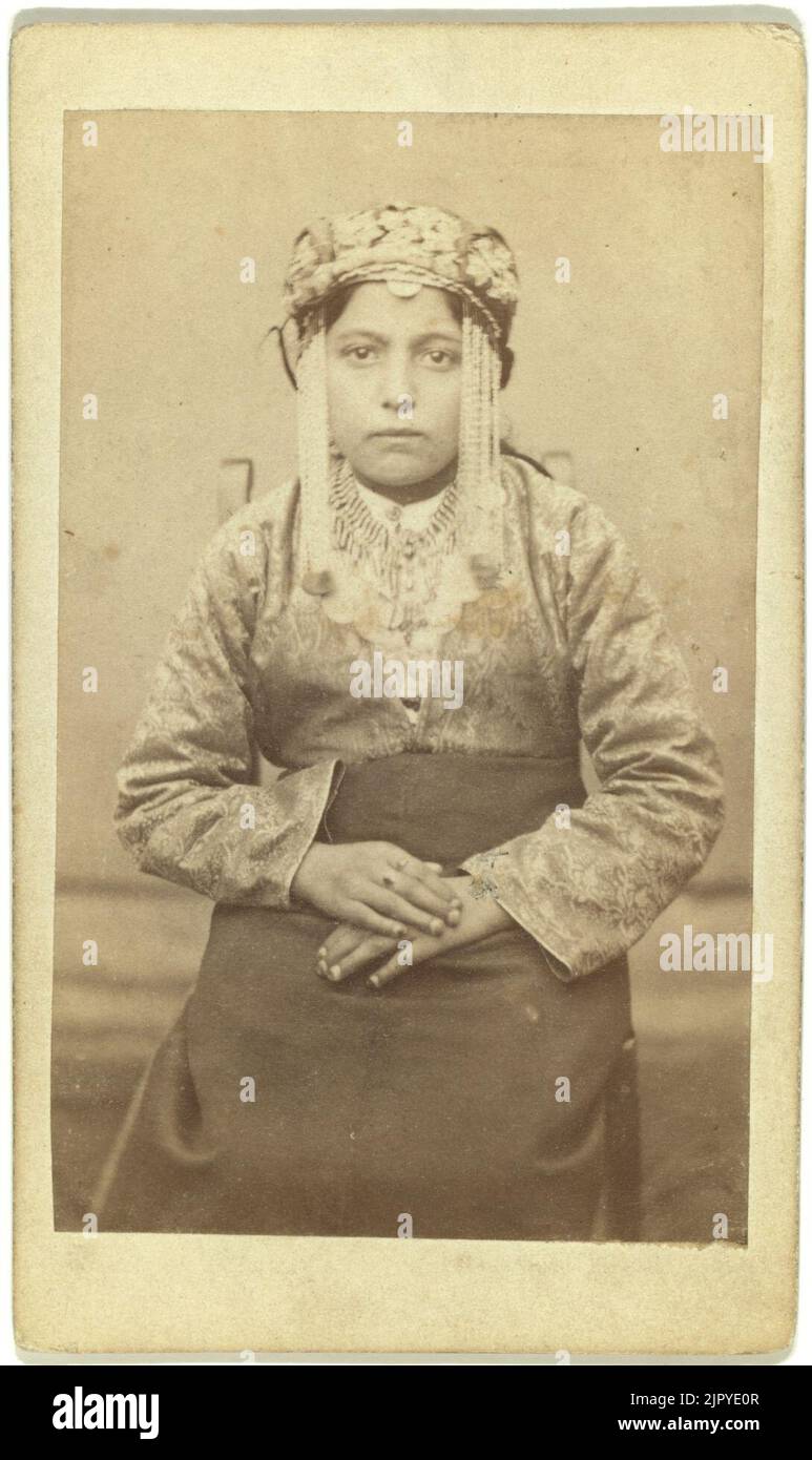 Three-quarters length portrait of a woman, seated, facing front Stock ...
