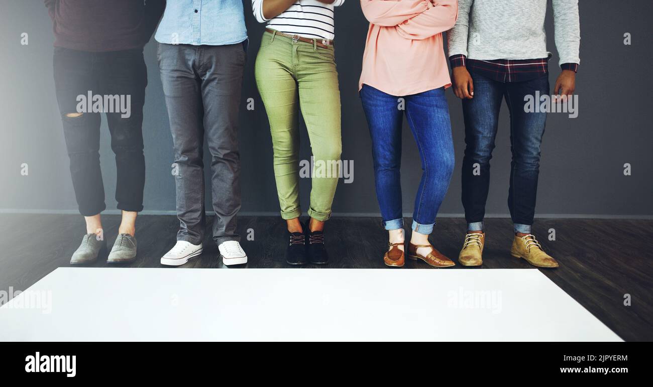 Theyve got your message right at their feet. Cropped studio shot of a ...