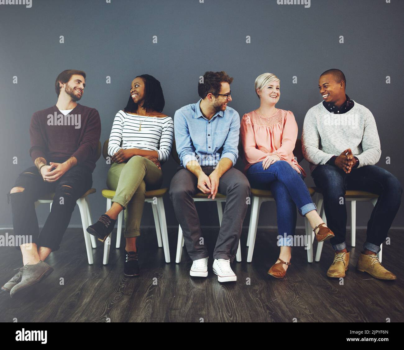 We can learn lots by just talking to each other. Studio shot of a group ...