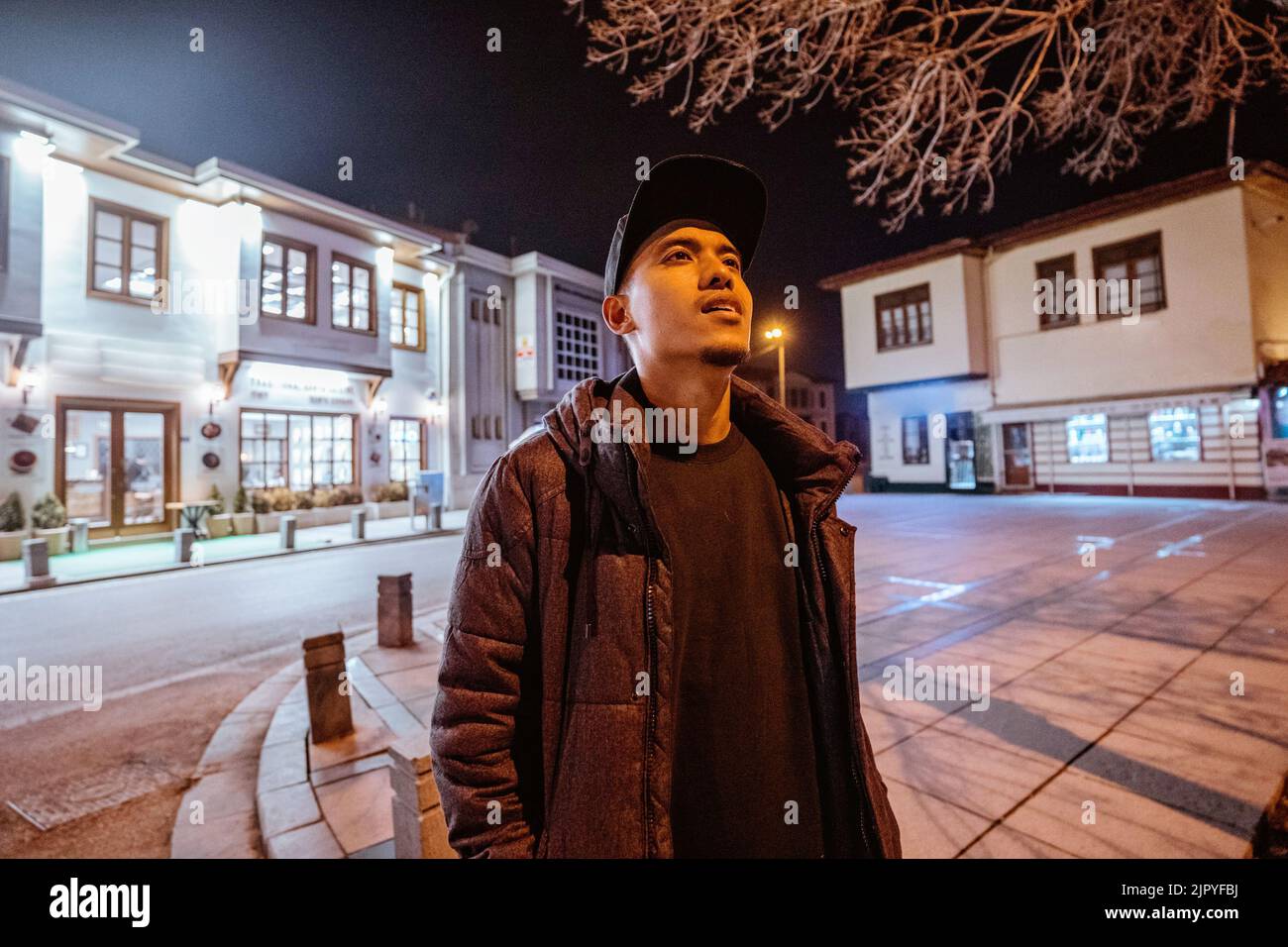 Handsome man tourist night city hi-res stock photography and images - Alamy