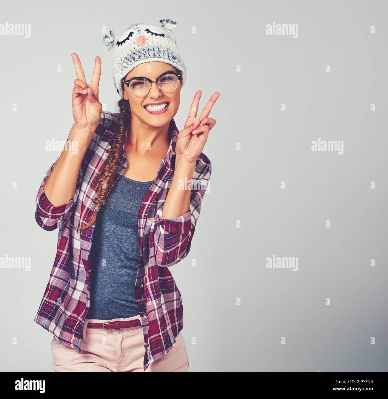 Spreading peace is what makes me happy. an attractive young woman ...
