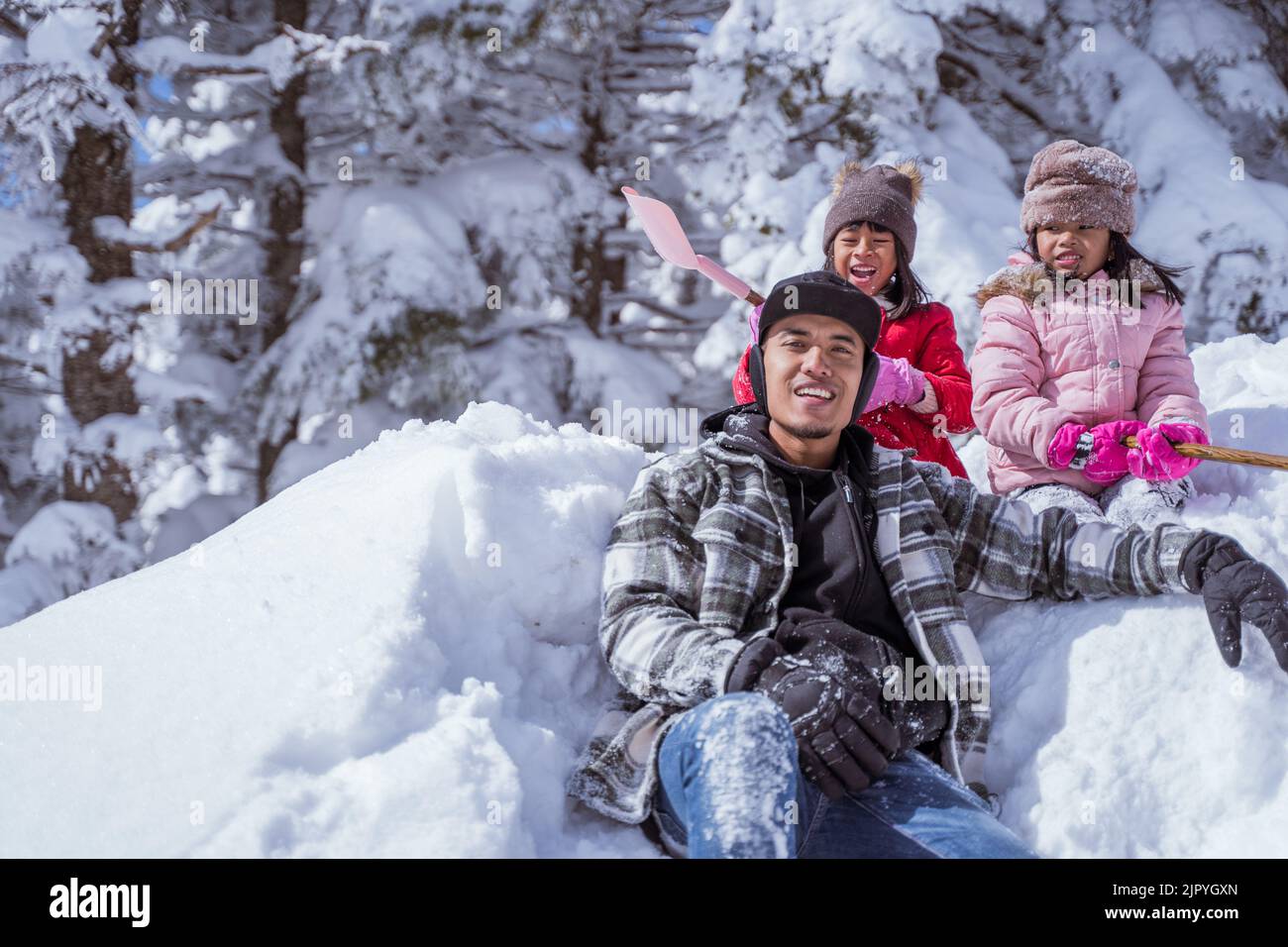 Kid snow pile hi-res stock photography and images - Alamy