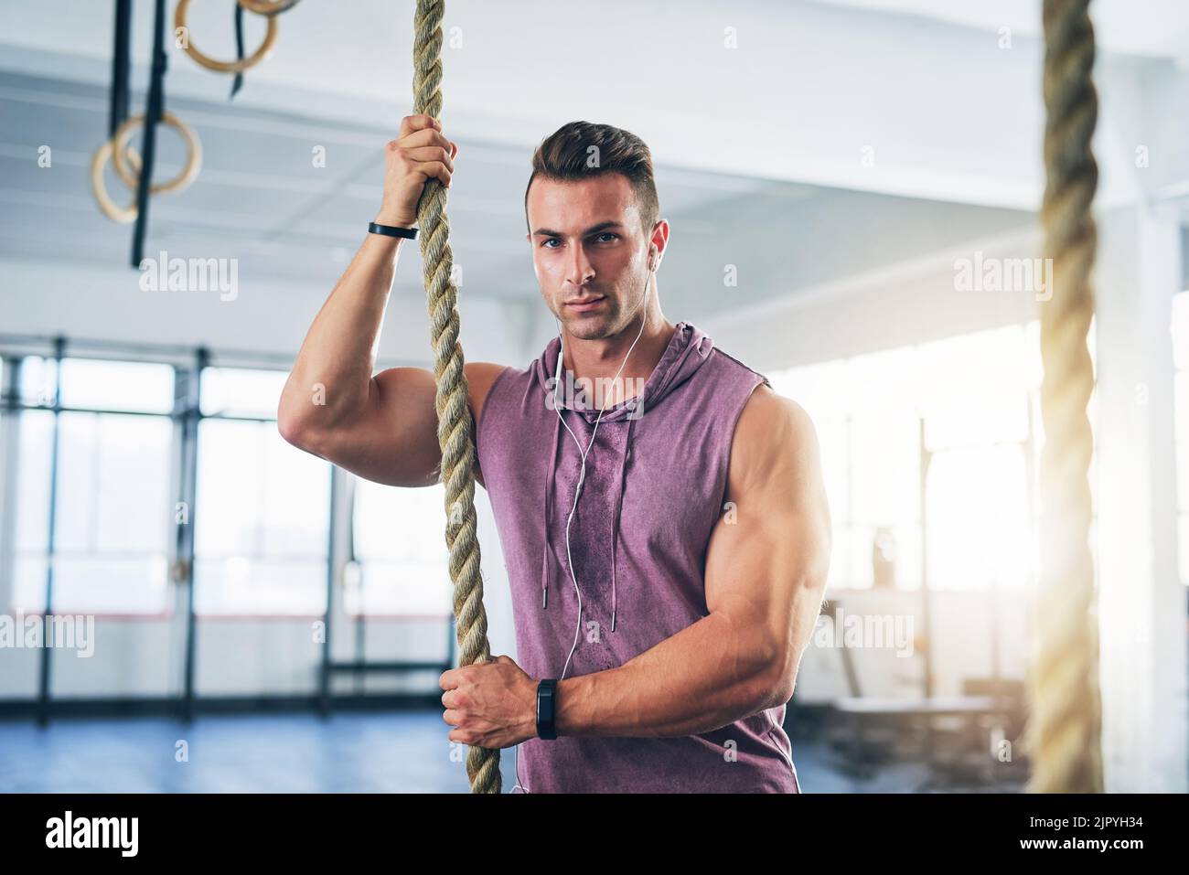 I believe in giving it all or nothing. Portrait of a muscular young man ...