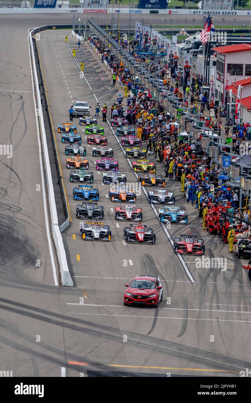 Madison, IL, USA. 20th Aug, 2022. The INDYCAR field comes down pit road ...