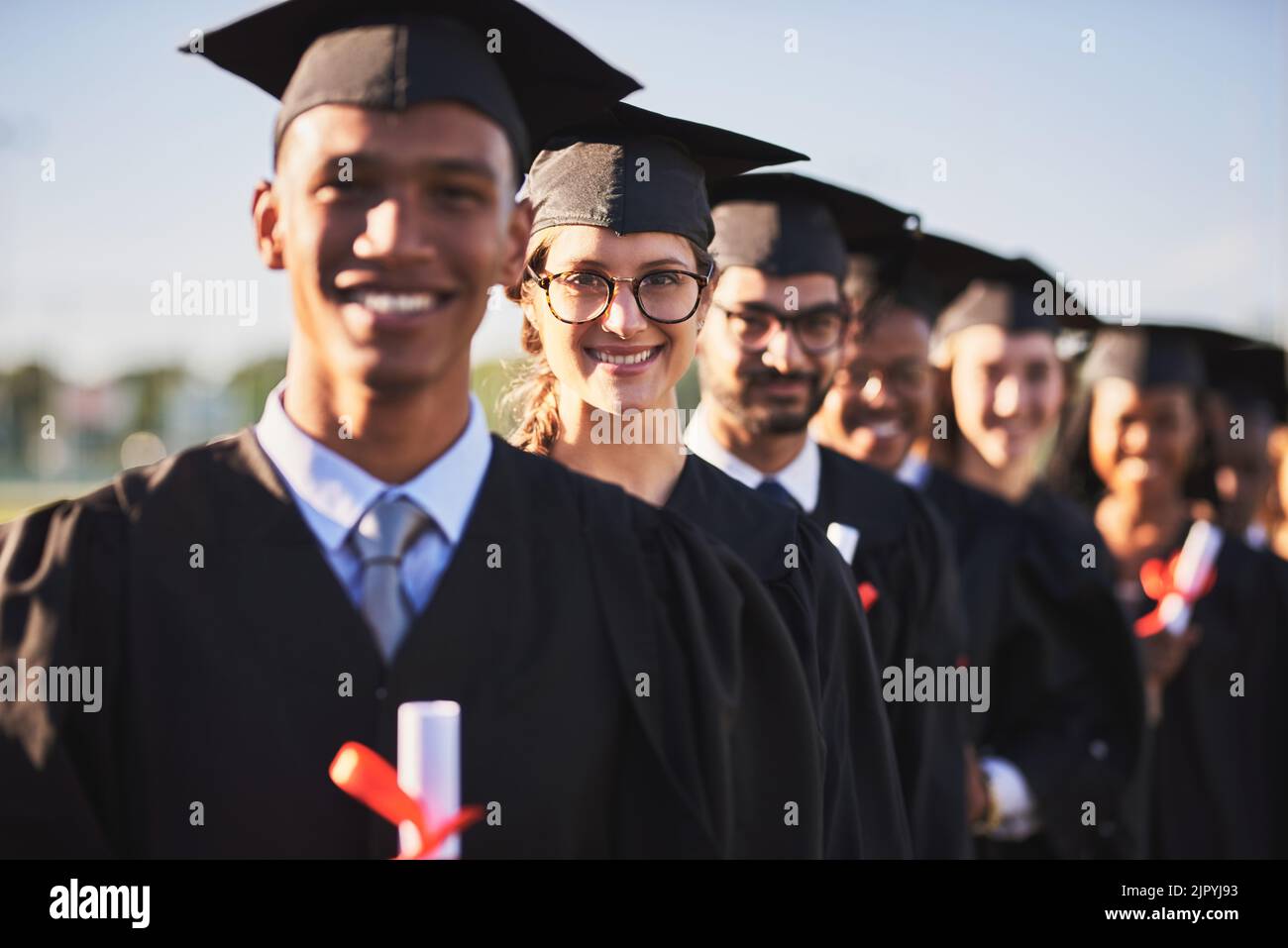 Graduating is both an ending and a beginning. Portrait of a smiling ...