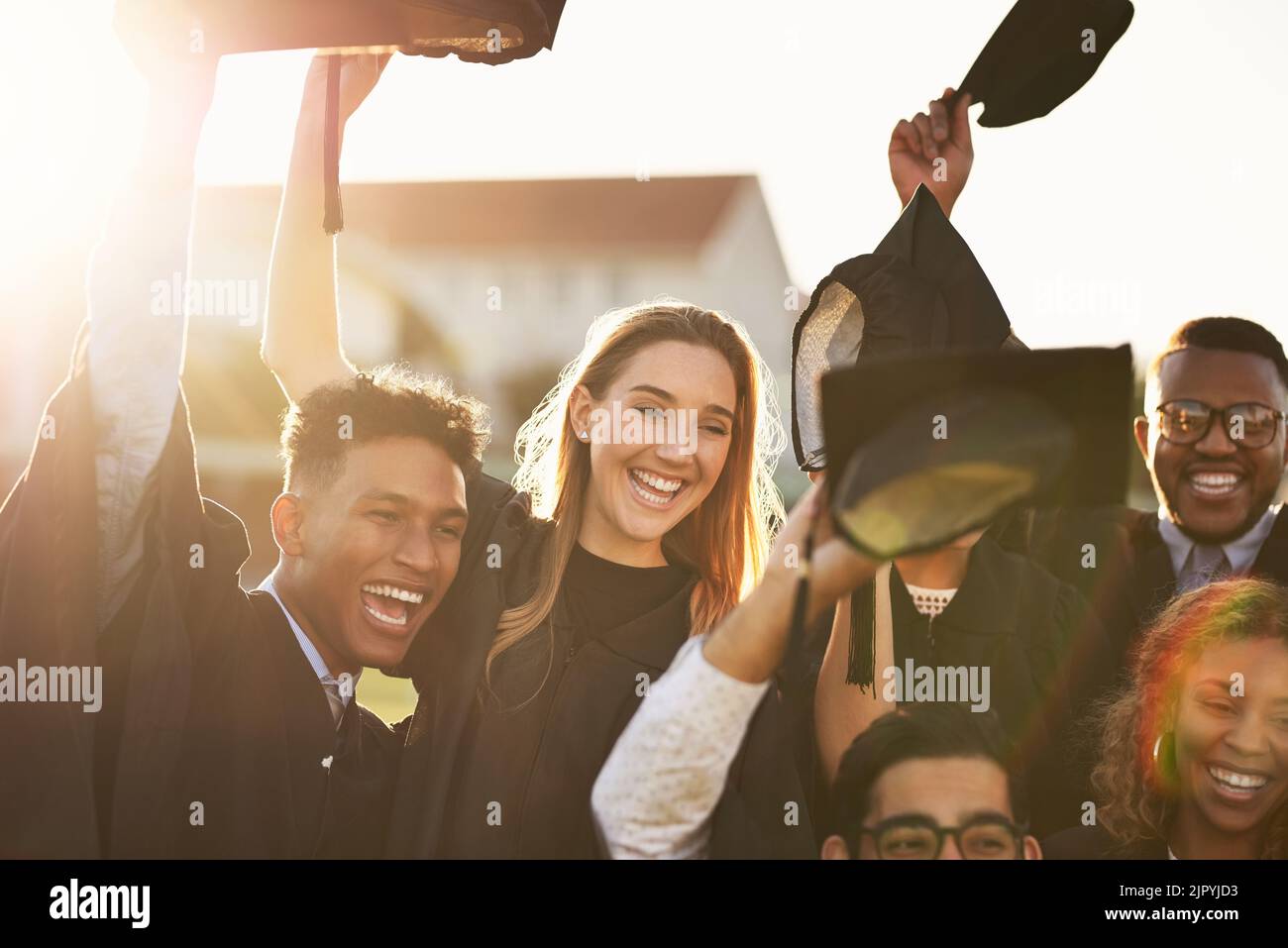 Today is our day. a group of smiling university students cheering and ...