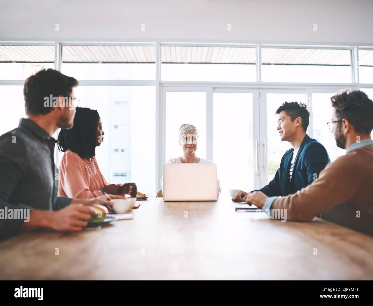 Get planning and make things happen. a group of young businesspeople ...