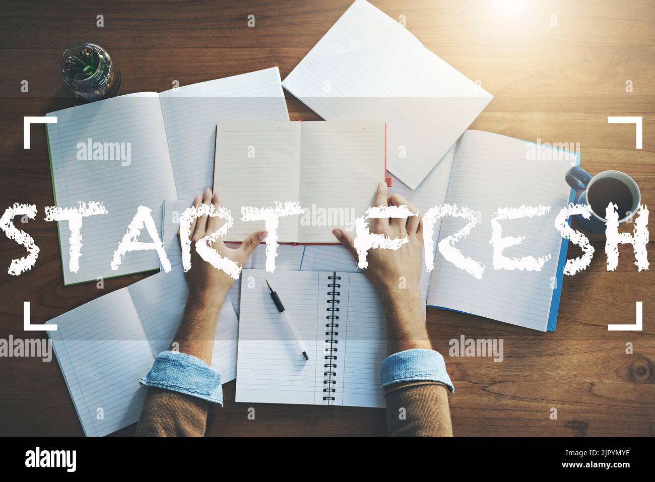 Making a fresh start. High angle shot of an unrecognisable person ...